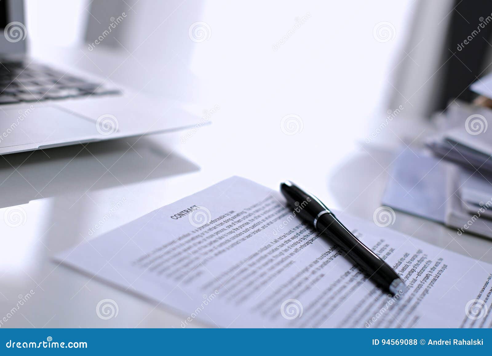 Office Workplace with a Laptop and Contract Document Stock Photo ...