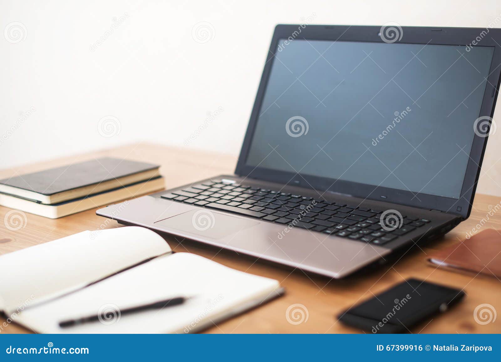 Office Workplace with Laptop, Smart Phone and Notebook on Wood Table ...