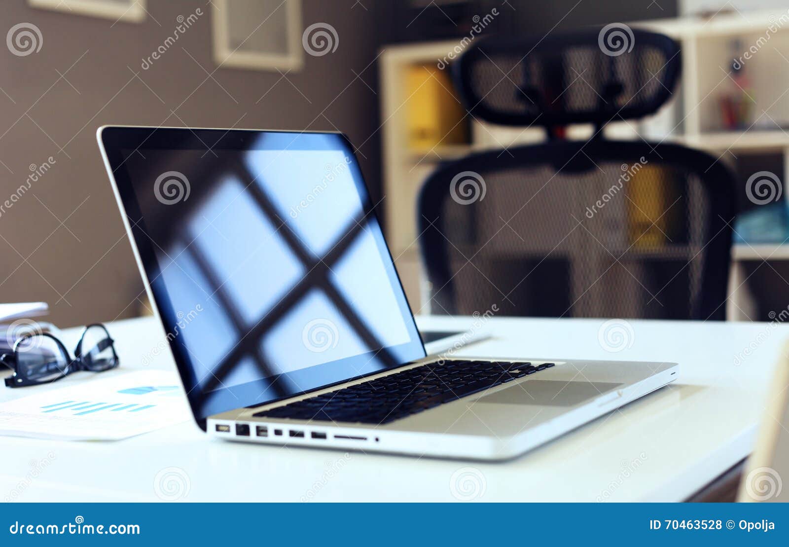 Office Workplace with Laptop on Wood Table Against the Windows Stock ...