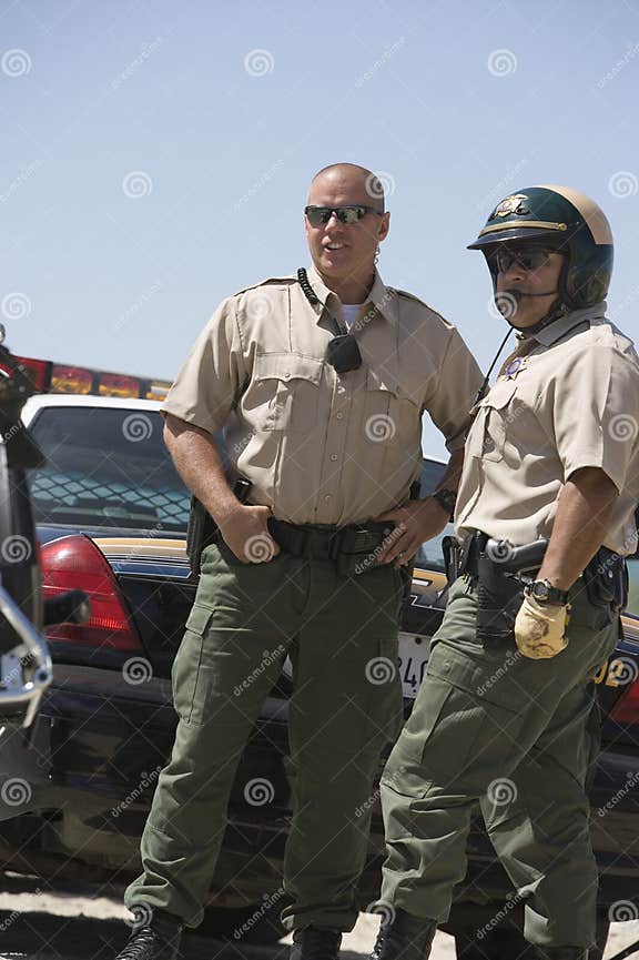 Officers Standing Together stock image. Image of policeman - 29651235