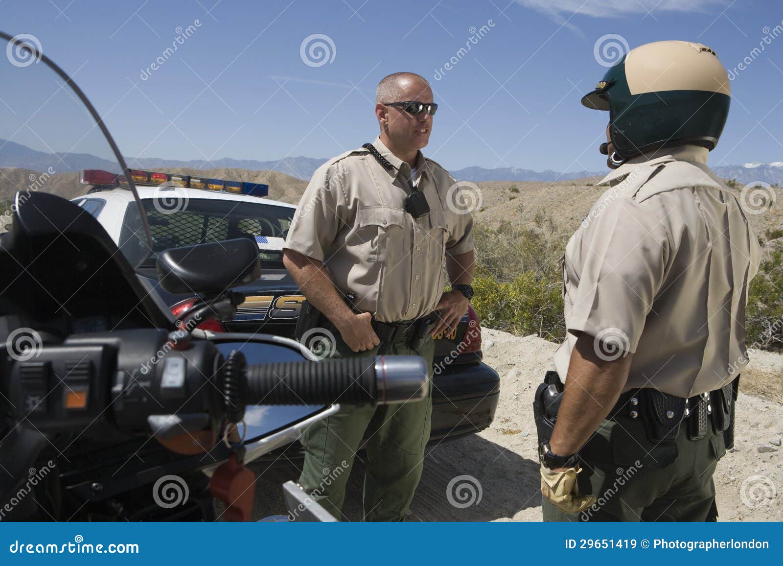 Officers Talking with Each Other Stock Image - Image of outdoors ...