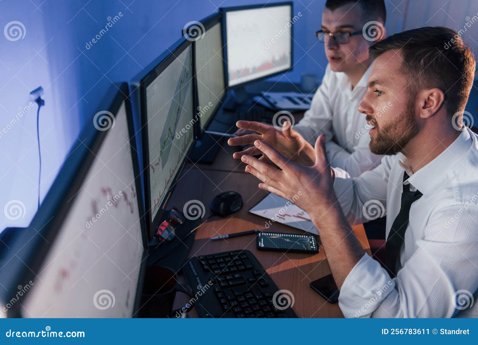In Official Clothes. Two Stock Traders Working in the Office with ...