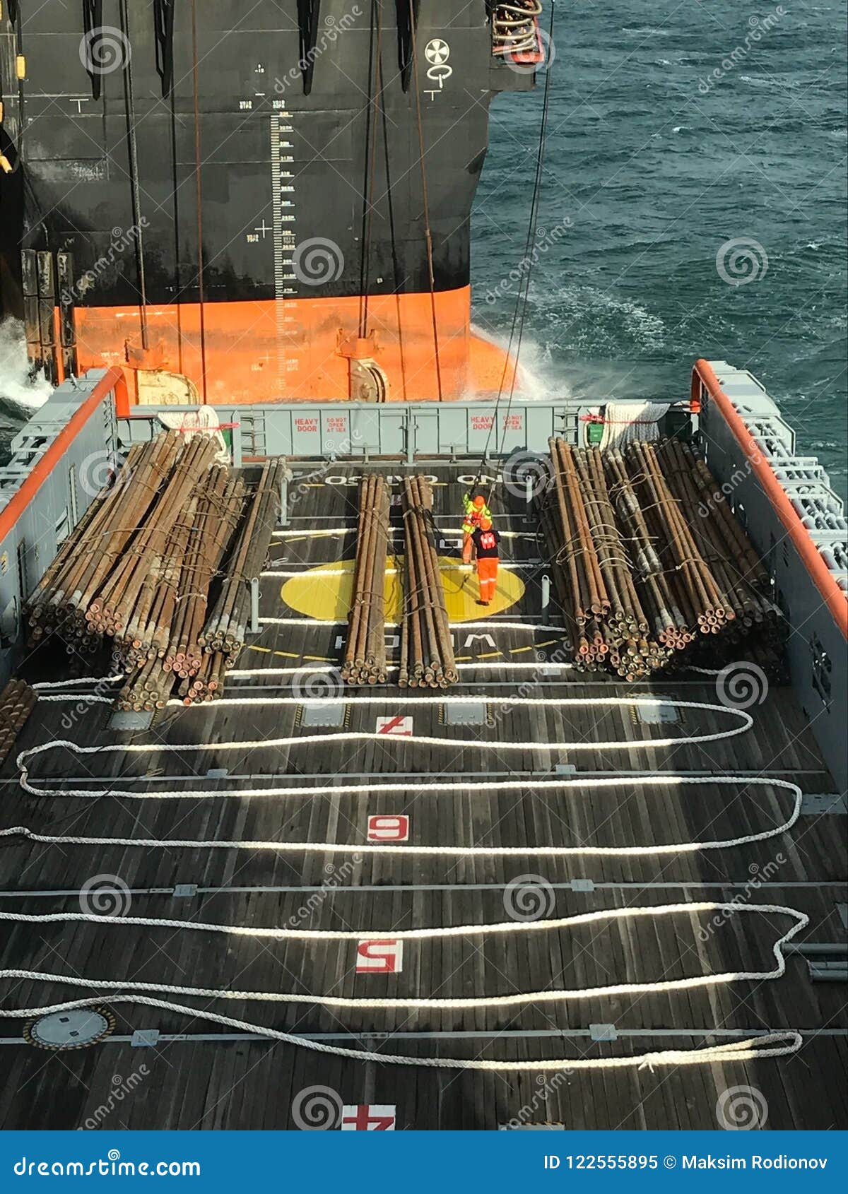 Pipe loading in Offshore editorial image. Image of pipe - 122555895