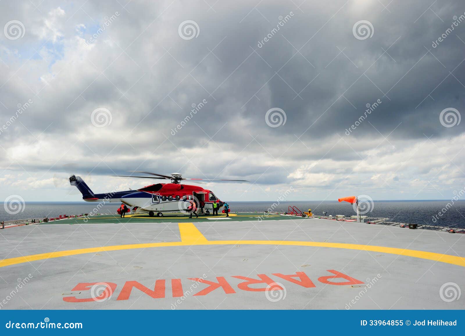 An Offshore Helicopter on the Helideck Stock Image - Image of offshore ...