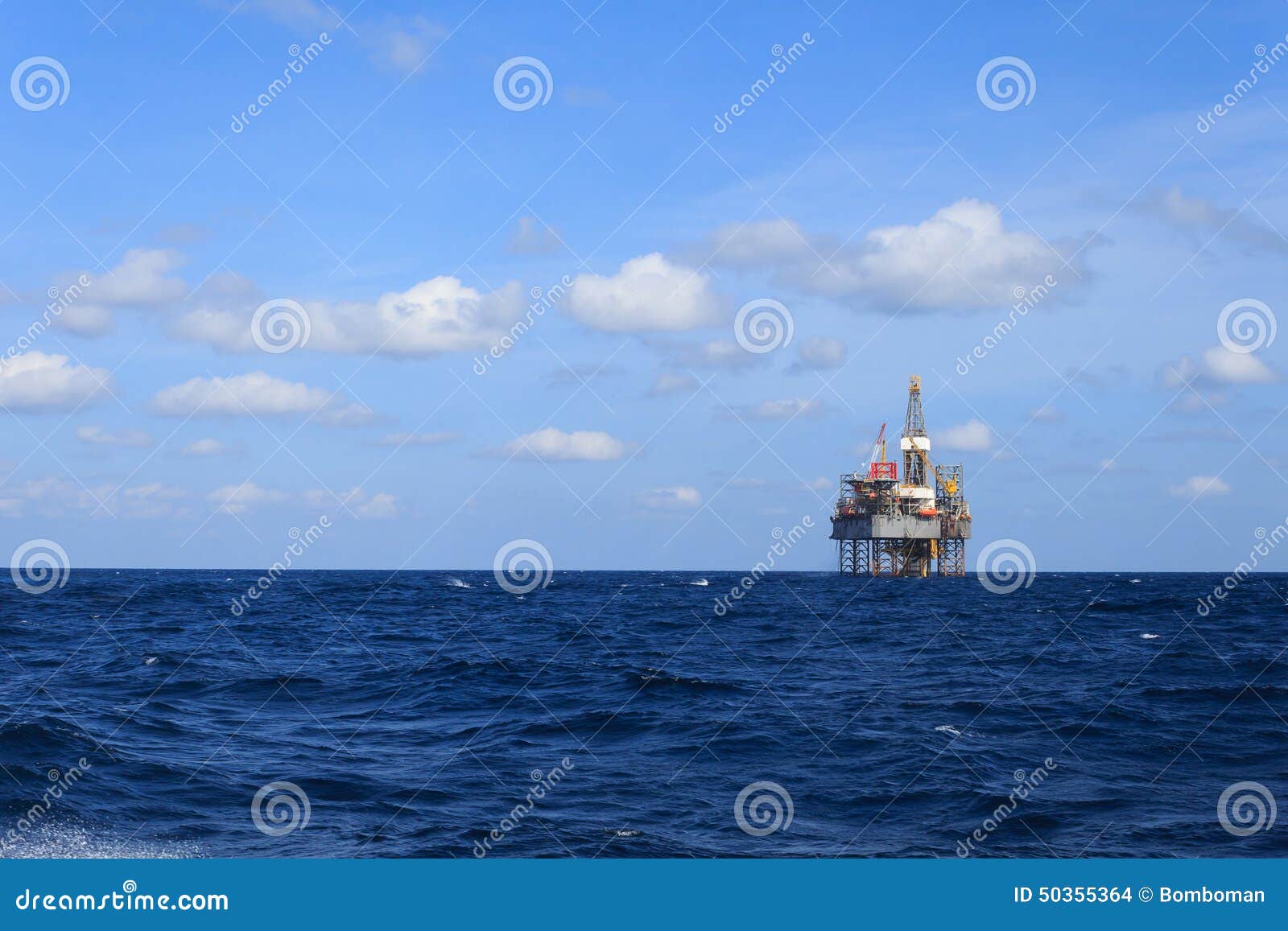 Offshore Jack Up Drilling Rig in the Middle of the Sea Stock Photo ...