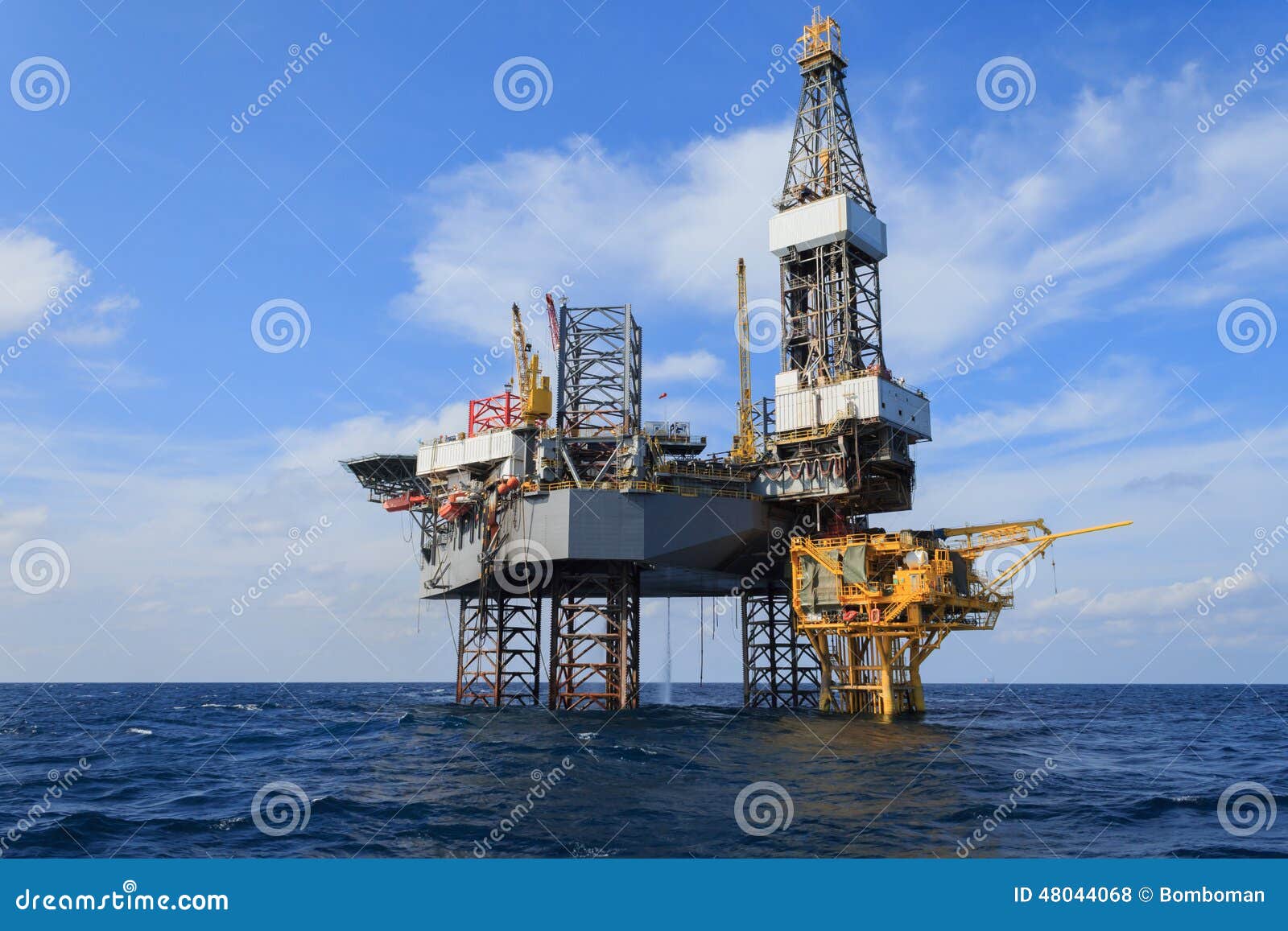 Offshore Jack Up Drilling Rig Over the Production Platform Stock Photo ...