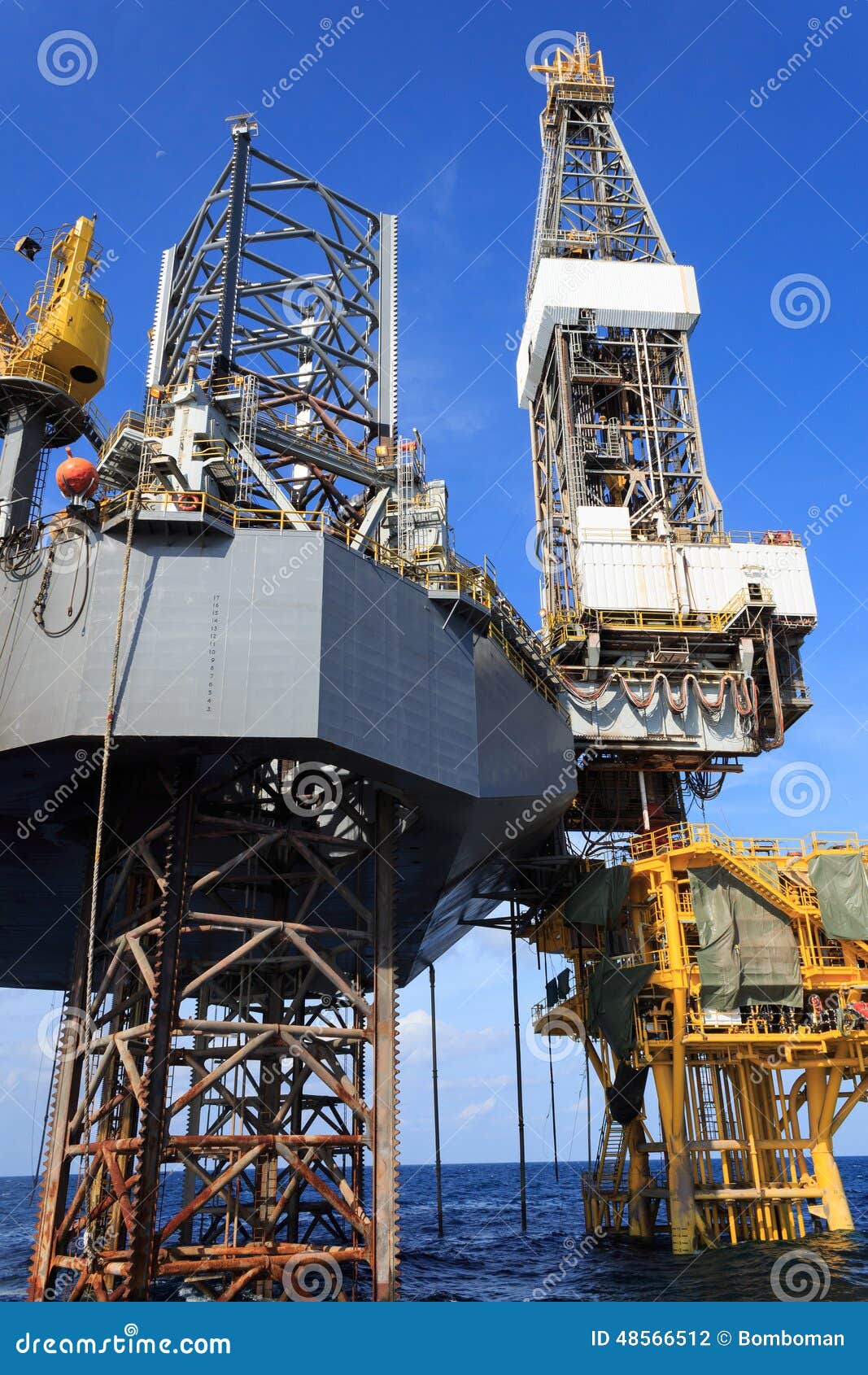 Offshore Jack Up Drilling Rig Over the Production Platform Stock Photo ...