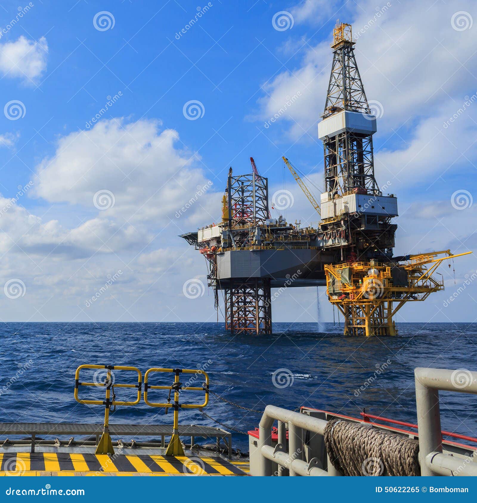 Offshore Jack Up Drilling Rig Over the Production Platform Stock Image ...