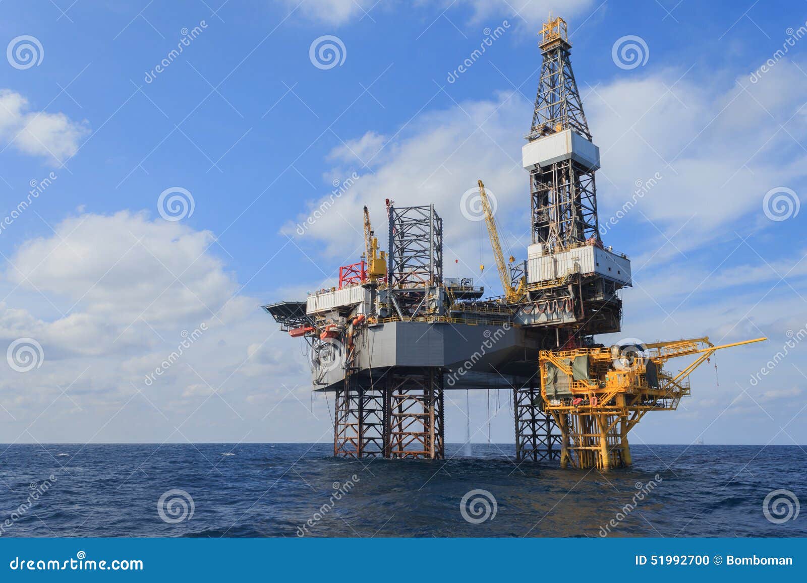 Offshore Jack Up Drilling Rig Over the Production Platform Stock Photo ...