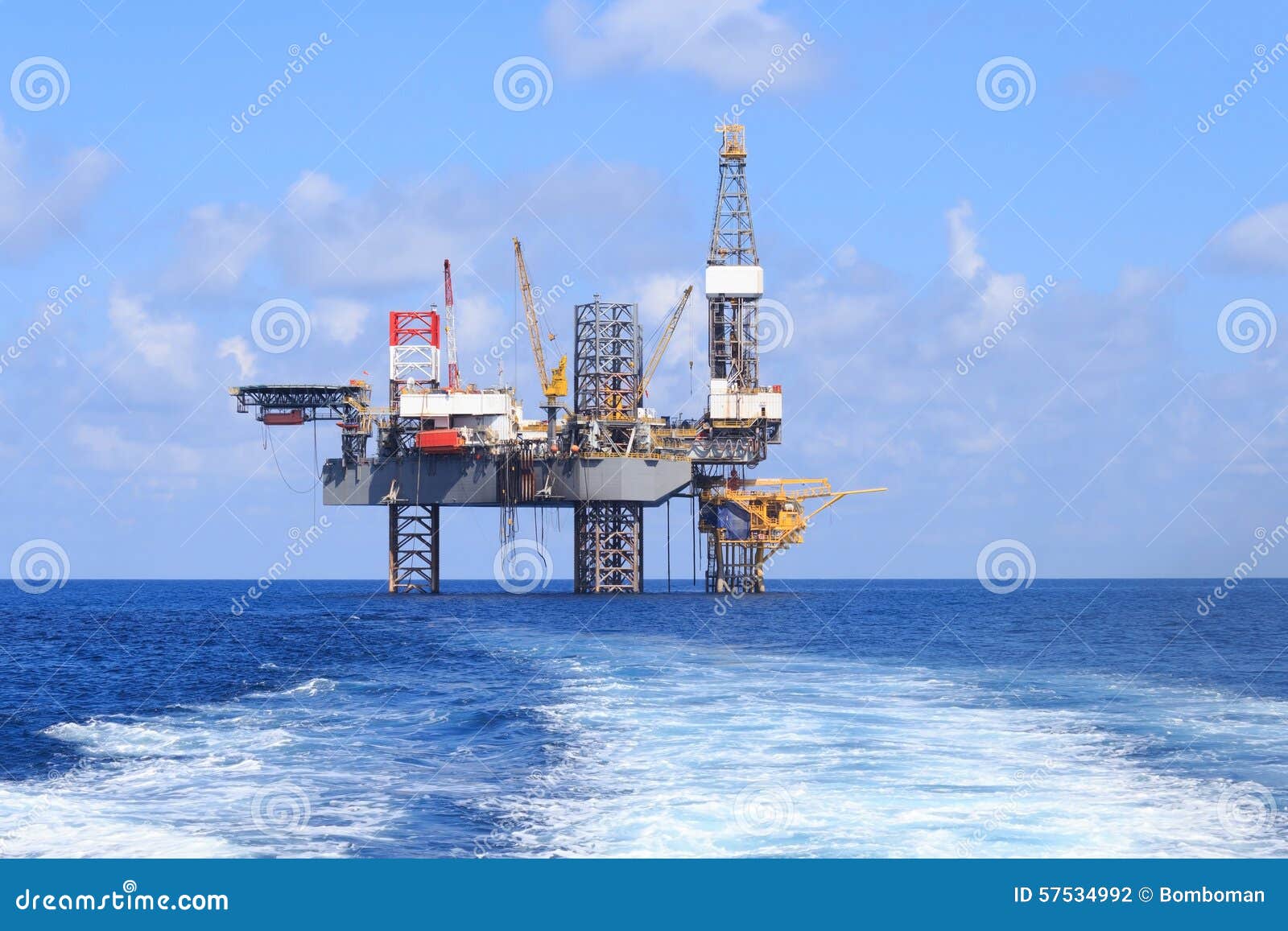 Offshore Jack Up Drilling Rig Over the Production Platform Stock Photo ...