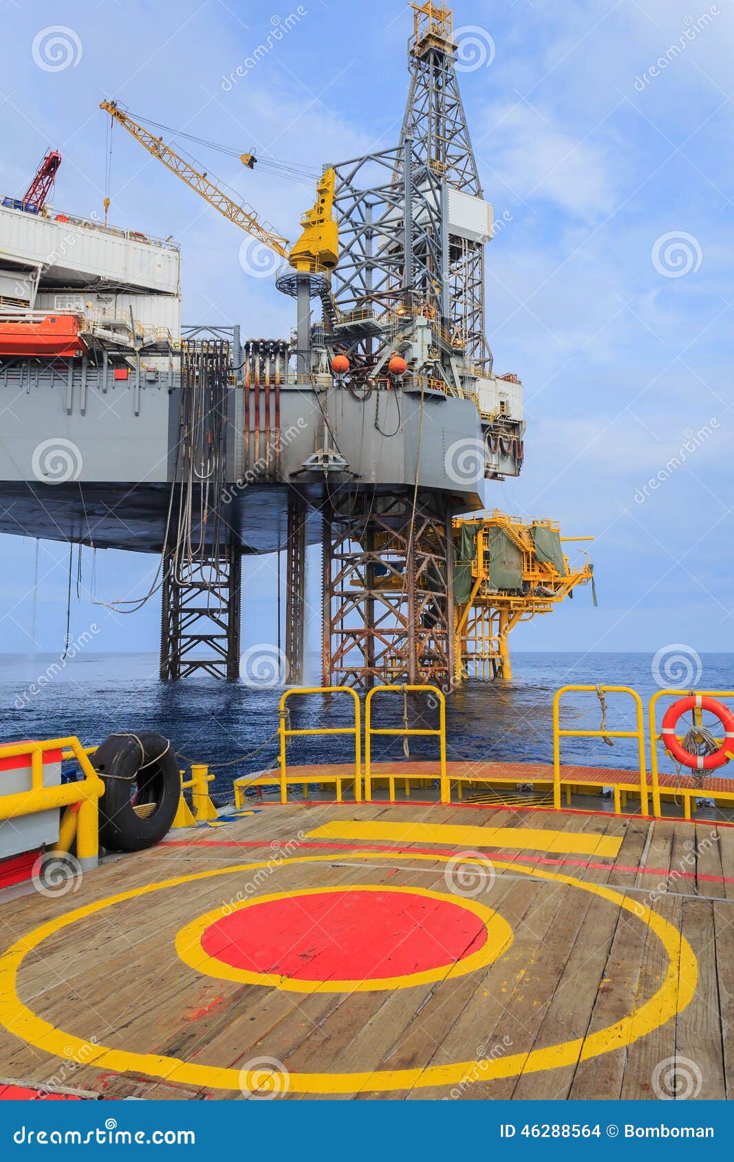 Offshore Jack Up Drilling Rig Over the Production Platform Stock Photo ...