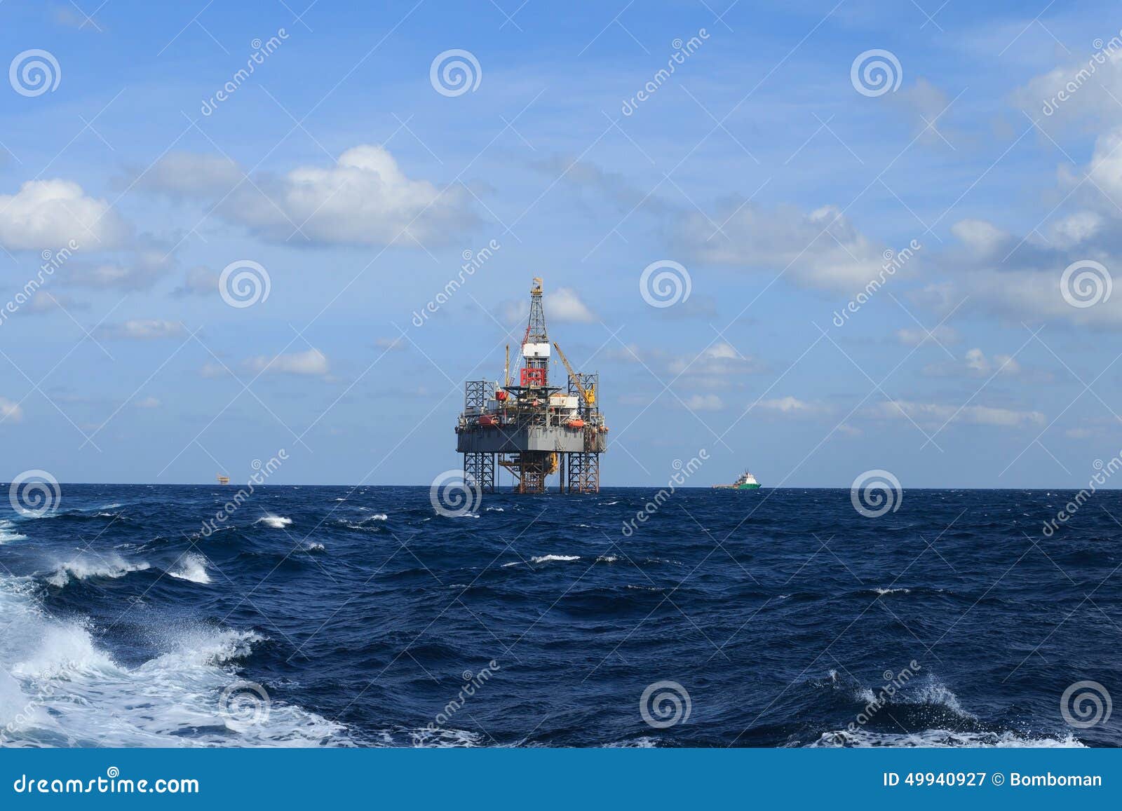 Offshore Jack Up Drilling Rig Over the Production Platform in Th Stock ...