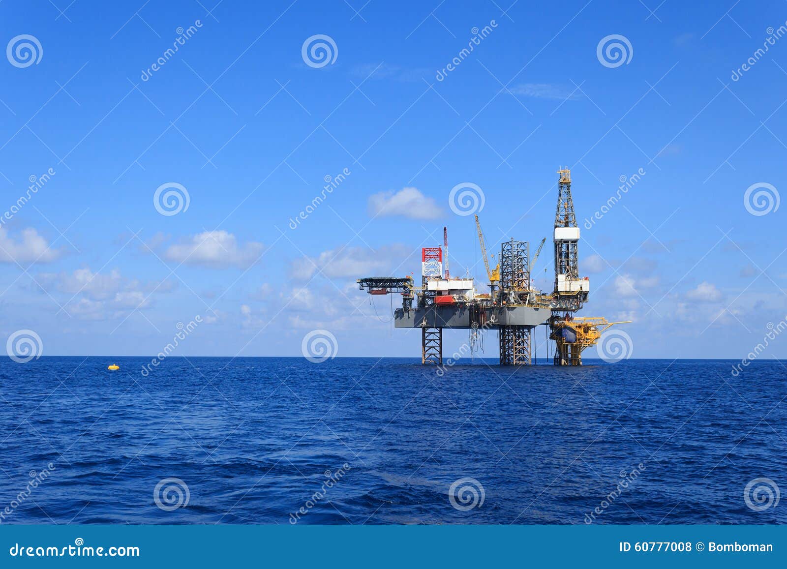 Offshore Jack Up Drilling Rig Over the Production Platform in Th Stock ...
