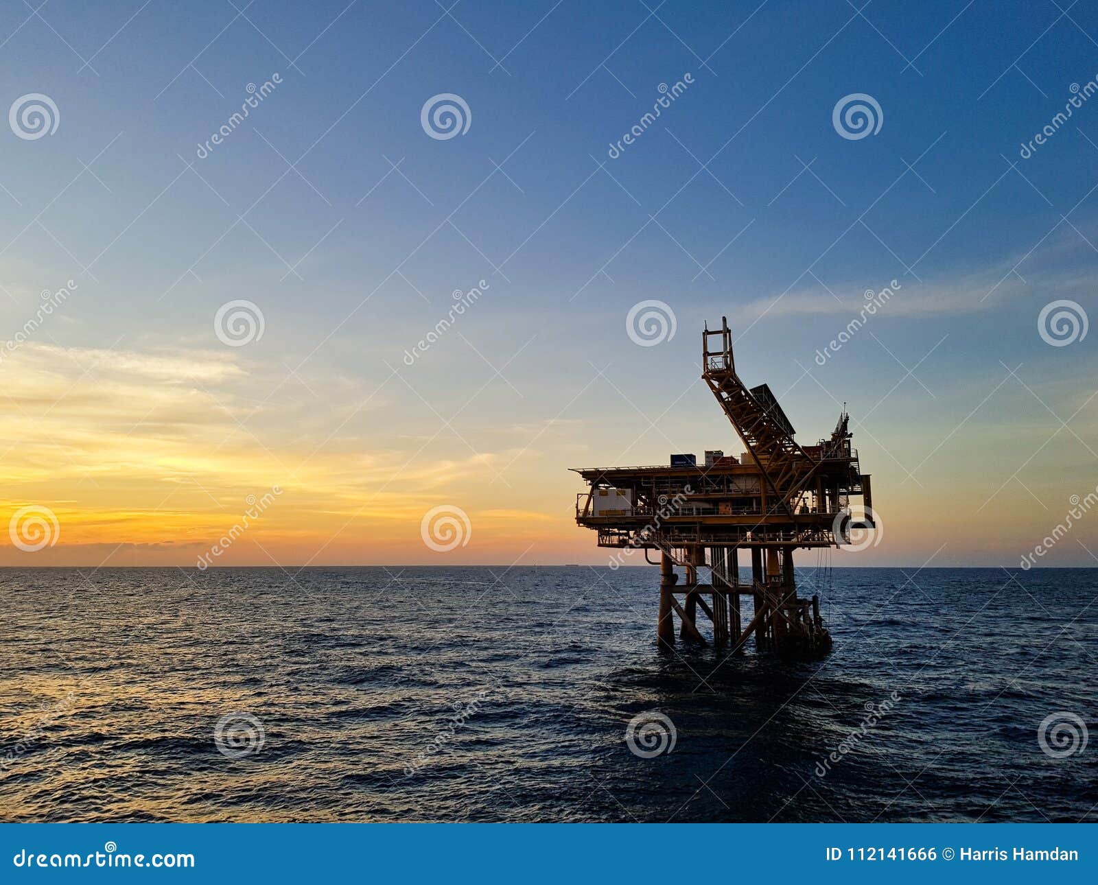 Oil Rig and Sunset stock photo. Image of installation - 112141666 Oil Rig and Sunset stock photo. Image of installation - 112141666