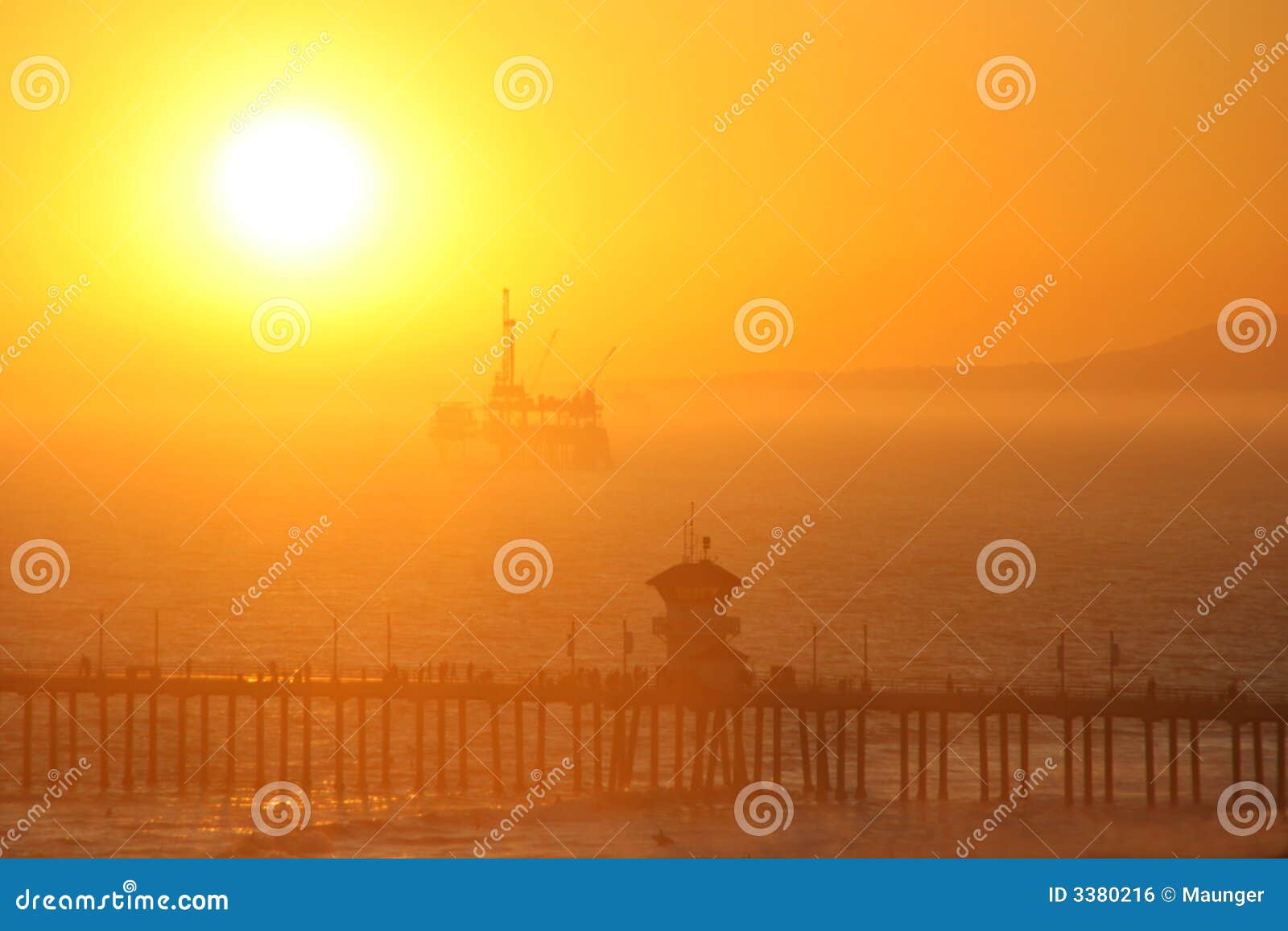 Offshore oil rig at sunset stock photo. Image of orange - 3380216