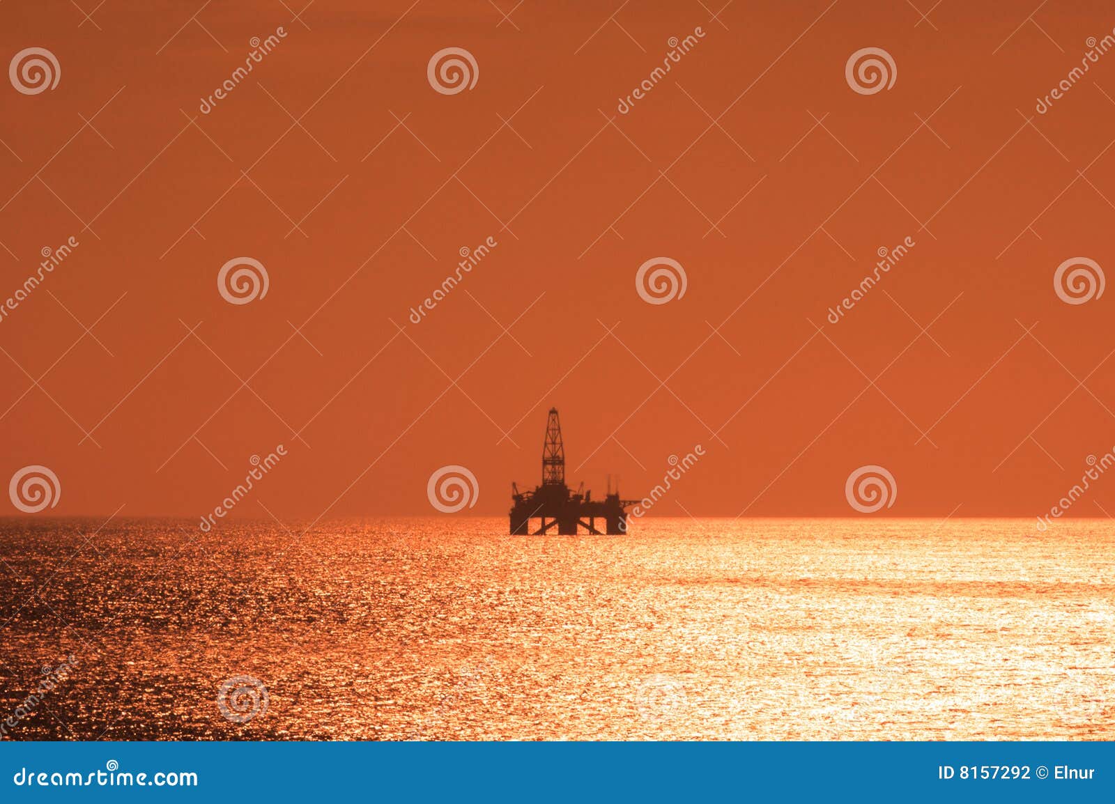 Offshore Oil Rig during Sunset Stock Photo - Image of land, machinery ...