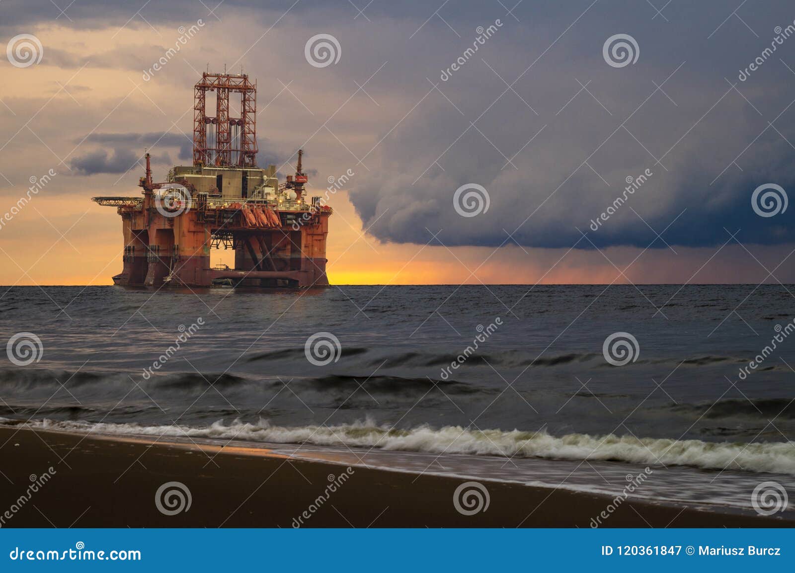 Offshore oil rig at sunset stock image. Image of production - 120361847