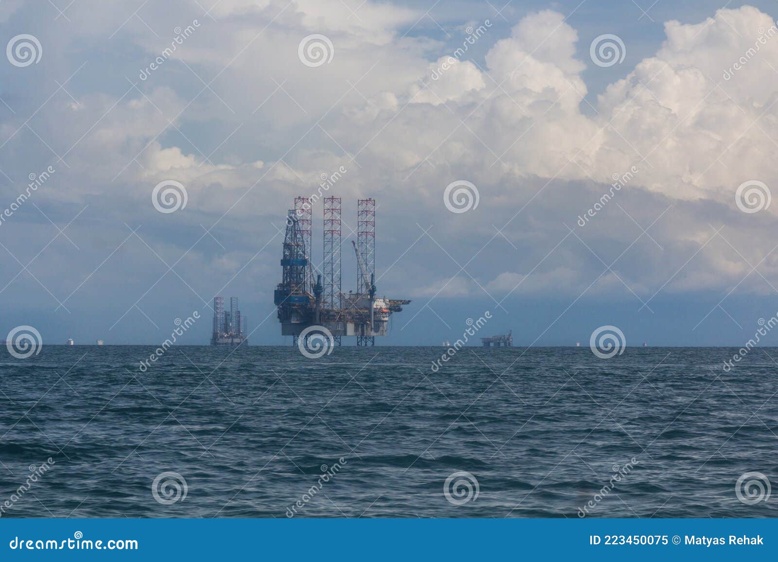 Offshore oil rigs in Brun stock image. Image of pipeline - 223450075