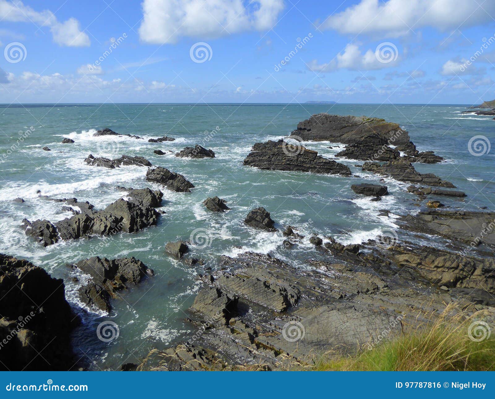 Offshore rocks and waves stock photo. Image of rocks - 97787816
