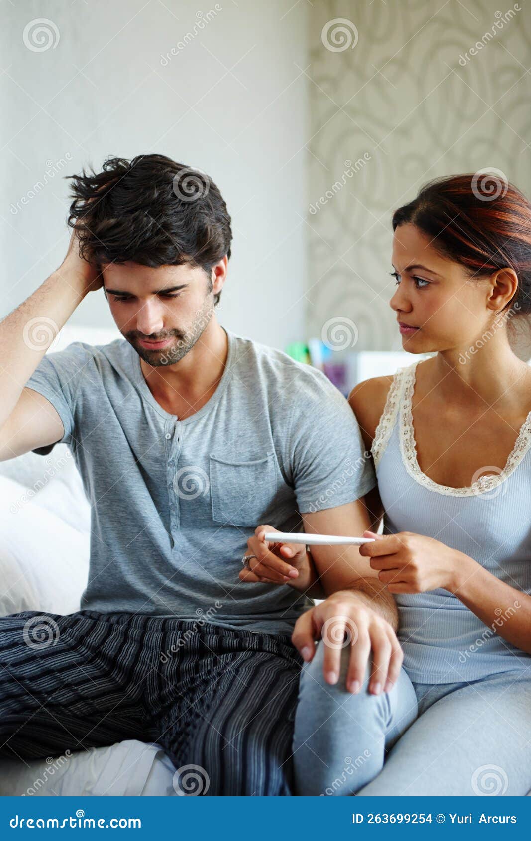 Oh Boy. Overwhelmed Couple Reading a Pregnancy Test. Stock Photo ...