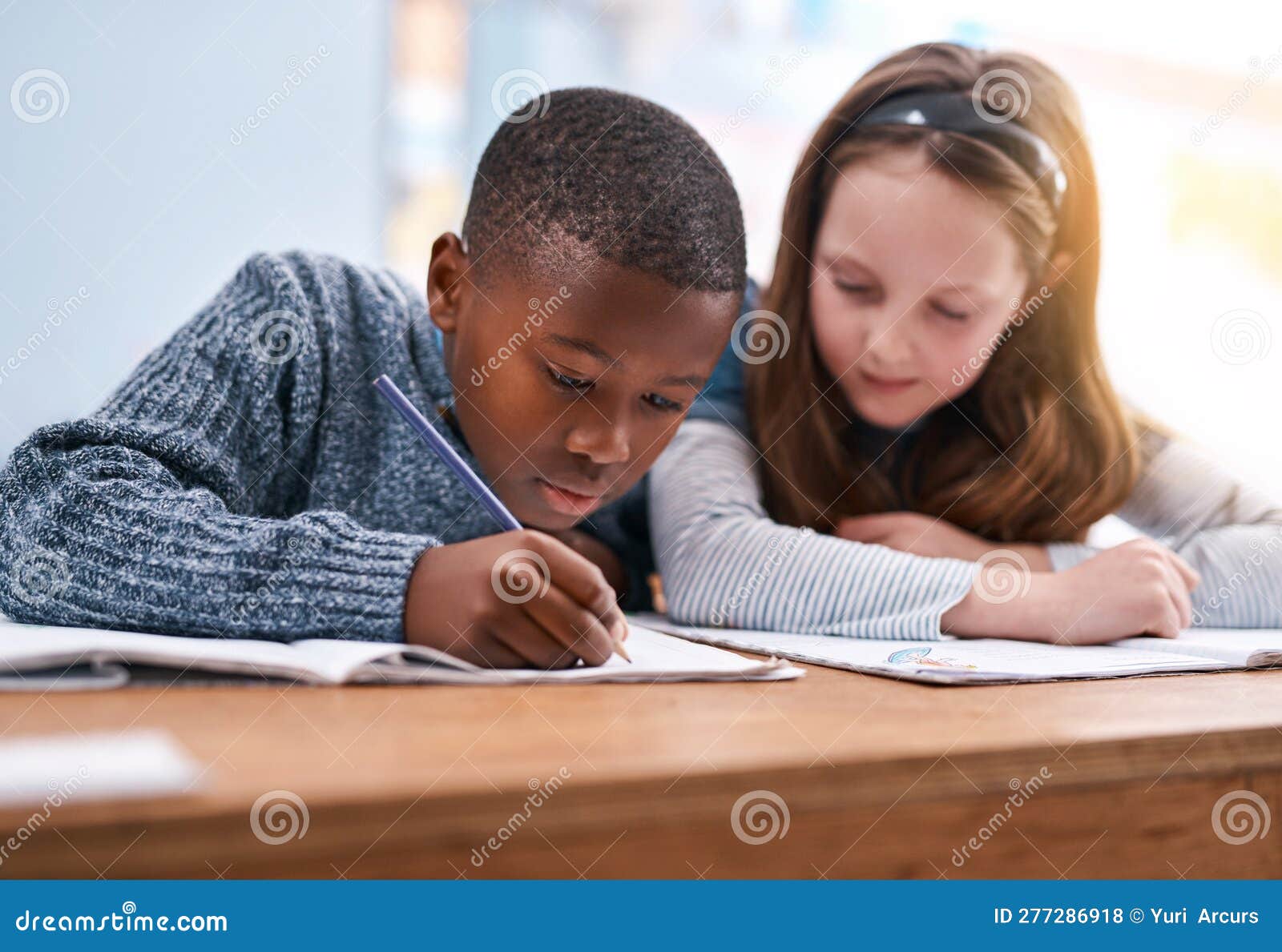 Oh so Thats How Its Done. Two Elementary School Kids Doing School Work ...