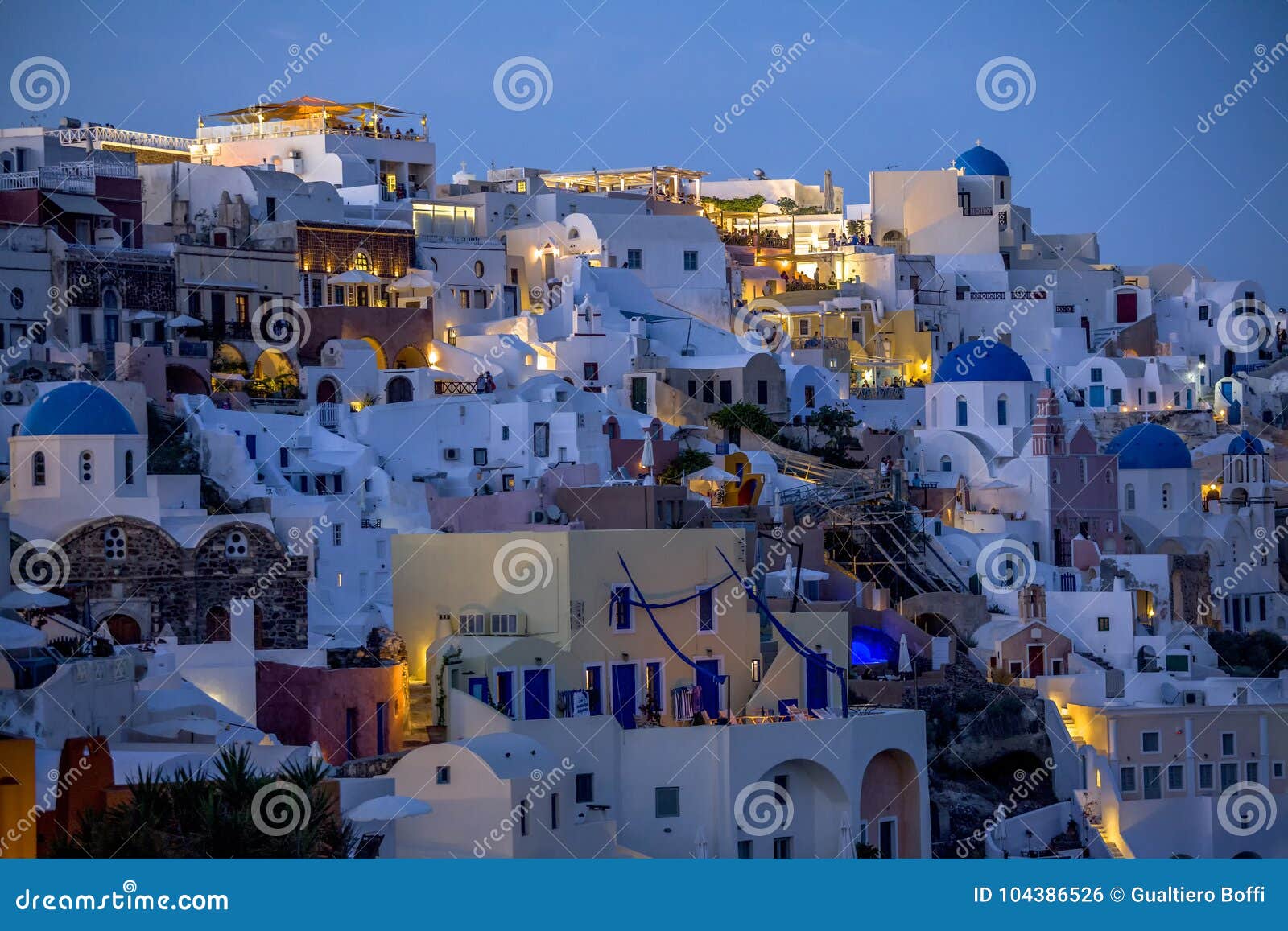 Oia at sunset stock photo. Image of building, travel - 104386526