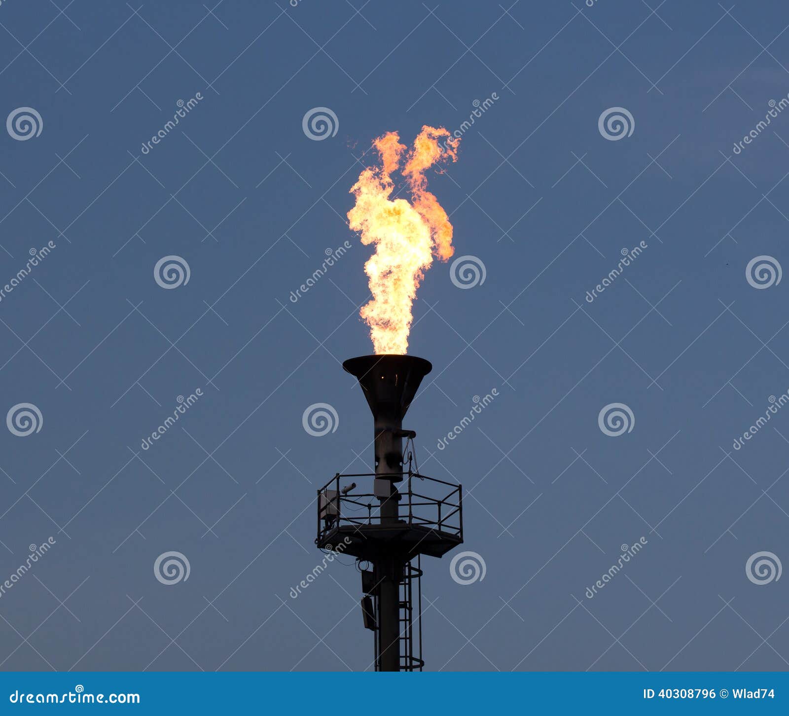 Oil Burning Torch Against a Blue Sky Stock Photo - Image of pollution ...