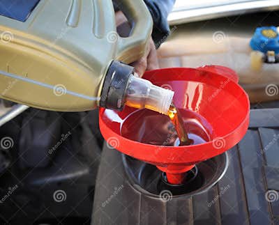 Oil changing stock image. Image of pouring, container - 28335989