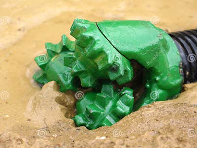 Oil drilling bit in mud stock image. Image of bore, black - 4772901