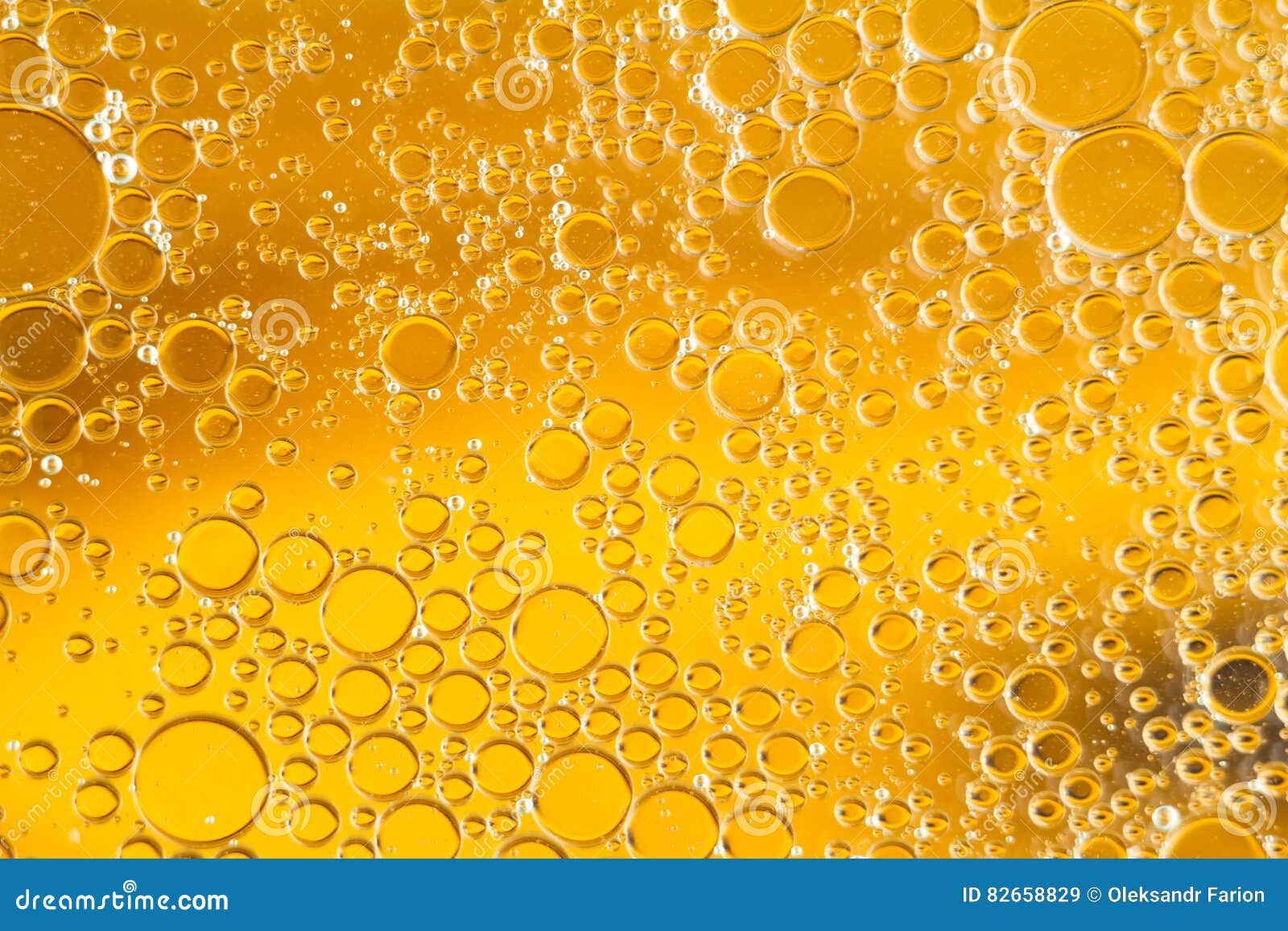 Oil Drops Floating in Water Abstract Orange Color Background. Stock ...