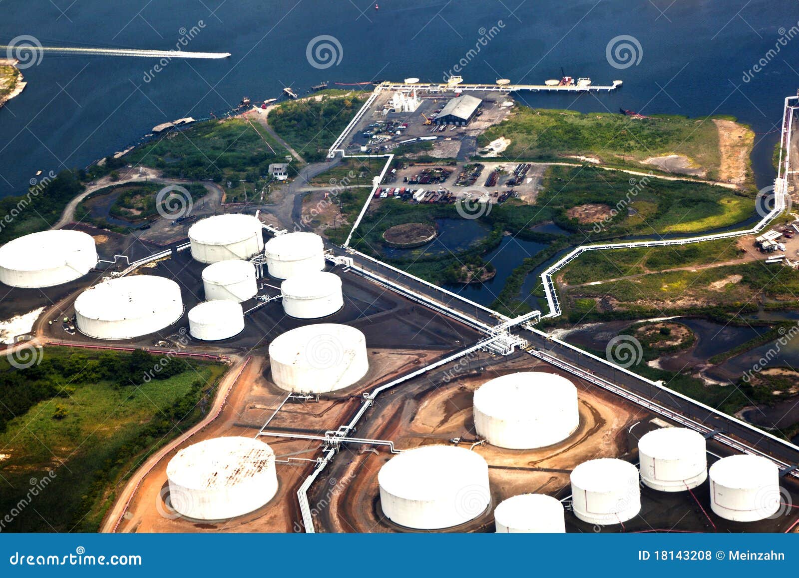Oil farm with river stock photo. Image of aircraft, load - 18143208