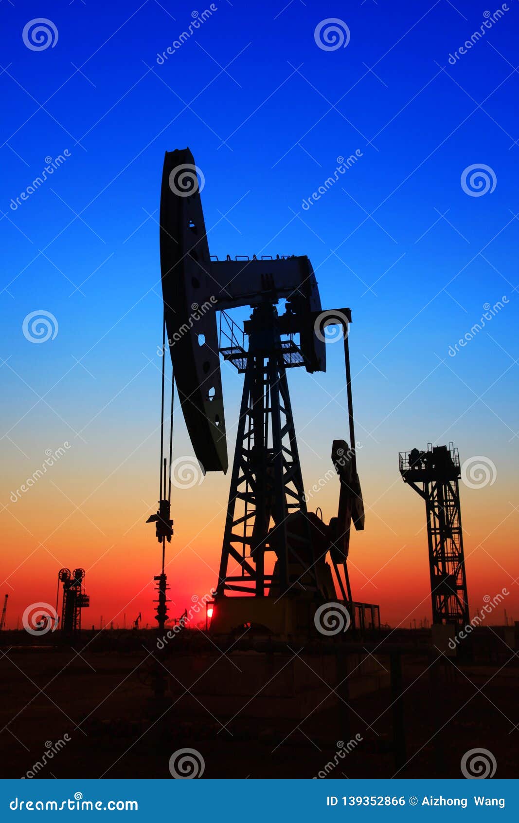 The Evening of Beam Pumping Unit in Silhouette Stock Photo - Image of ...