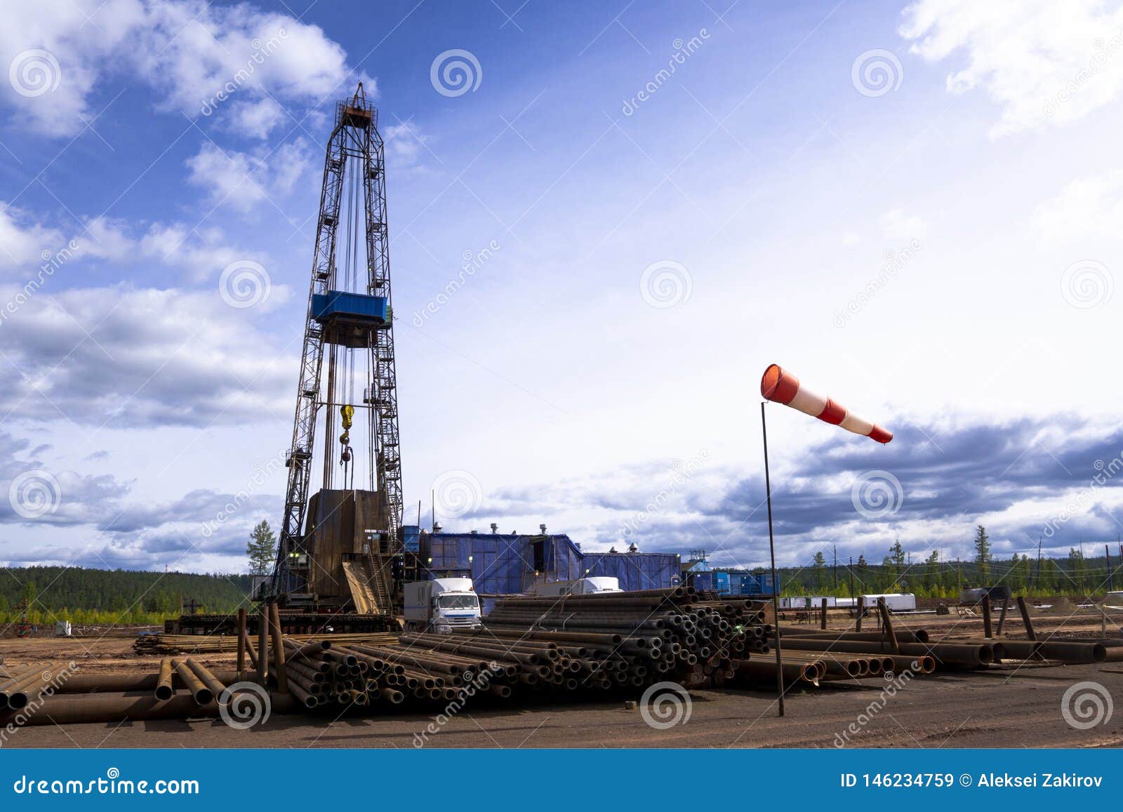 Oil and Gas Drilling Rig Onshore Dessert with Dramatic Cloudscape. Oil ...