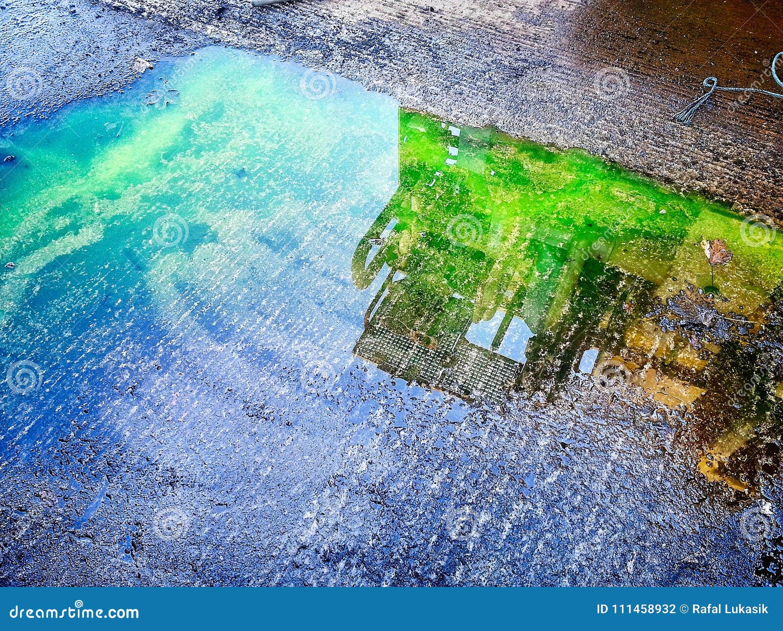 Puddle reflection stock photo. Image of steel, line - 111458932