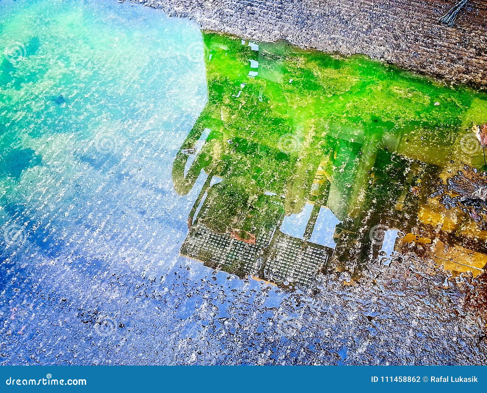 Puddle reflection stock photo. Image of mass, equipment - 111458862