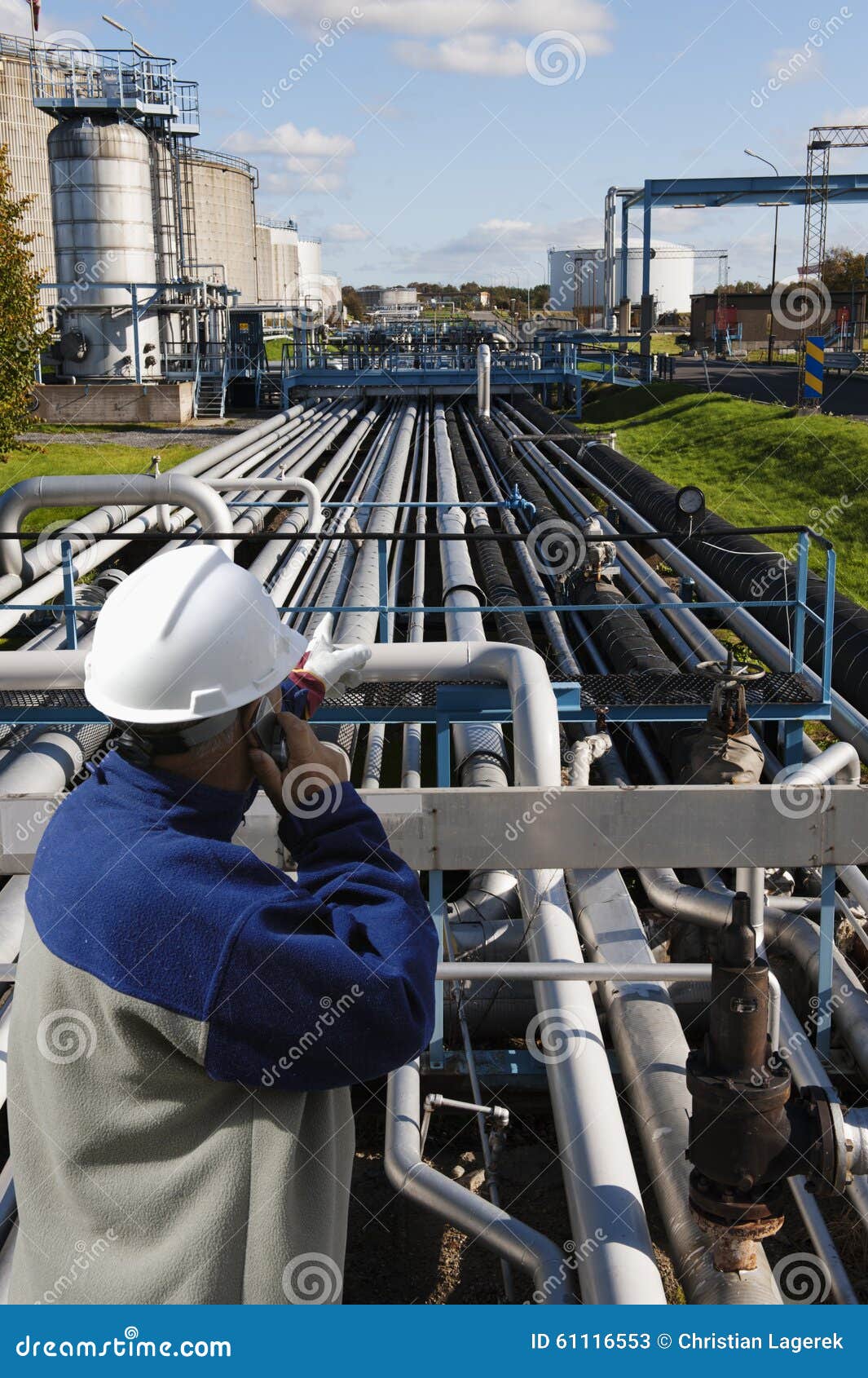 Oil and Gas Worker in Front of Refinery Stock Image - Image of pipes ...