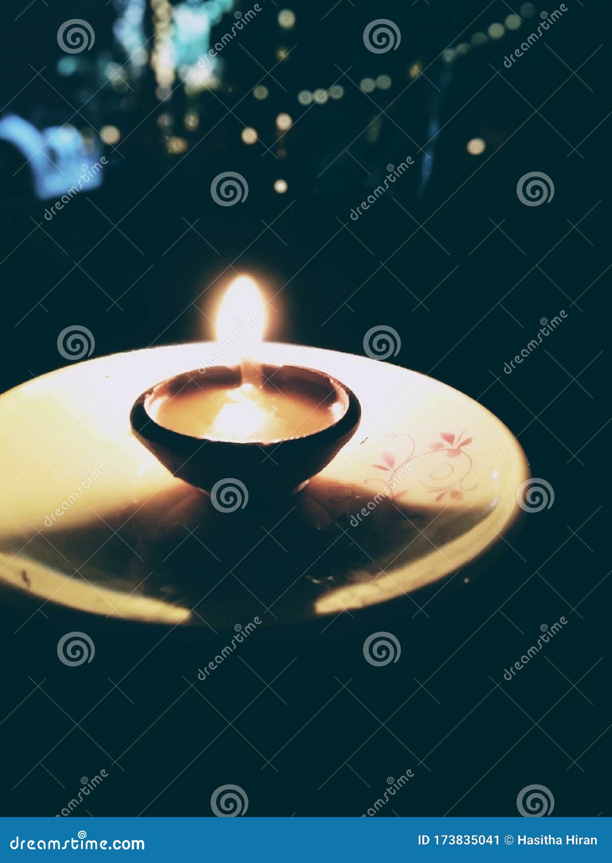 Oil lamp and plate stock image. Image of night, plate - 173835041