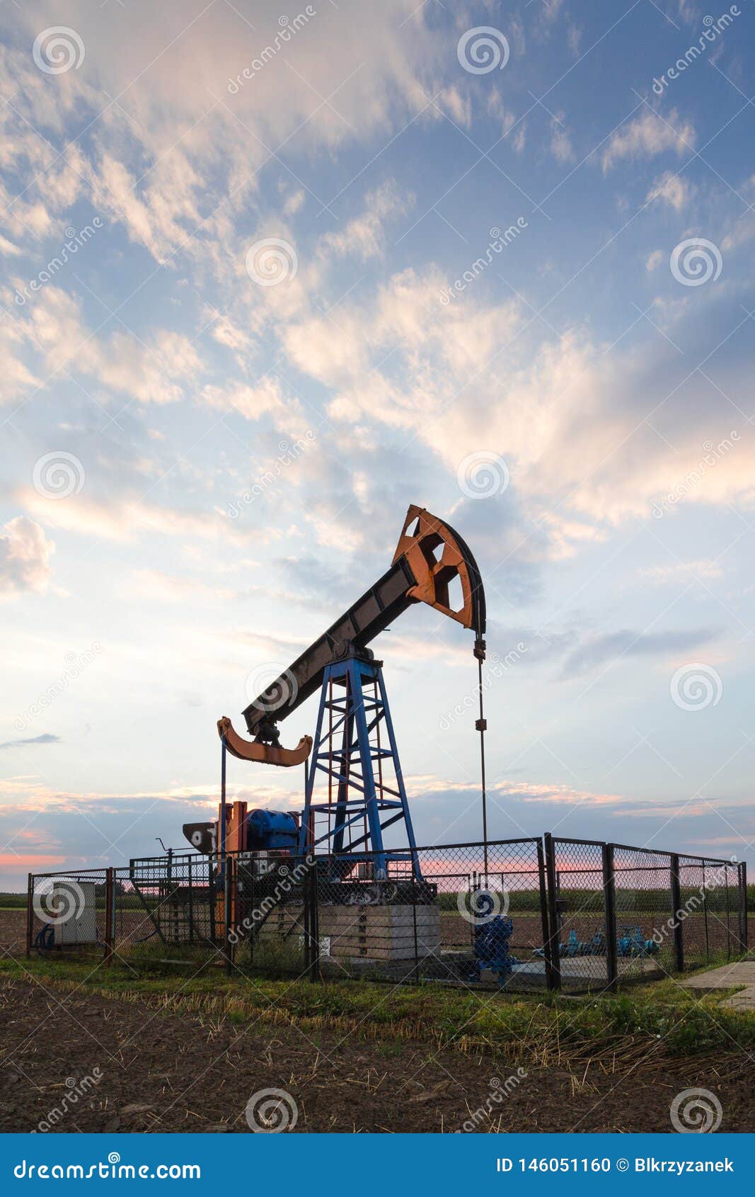 Oil mine at sunrise stock photo. Image of dawn, drilling - 146051160