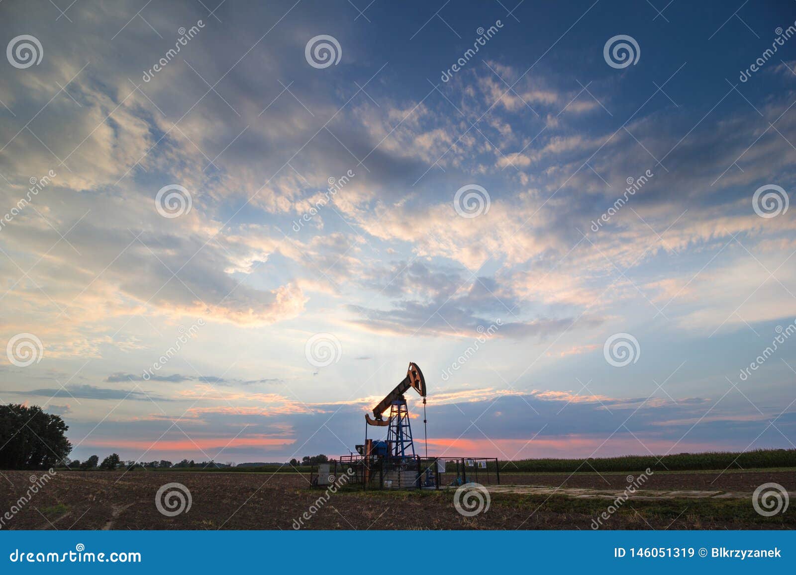 Oil mine at sunrise stock image. Image of natural, production - 146051319