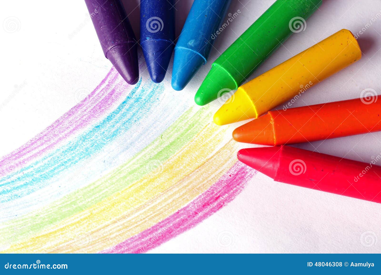Oil Pastel Crayons Lying on a Paper with Painted Rainbow Stock Photo ...