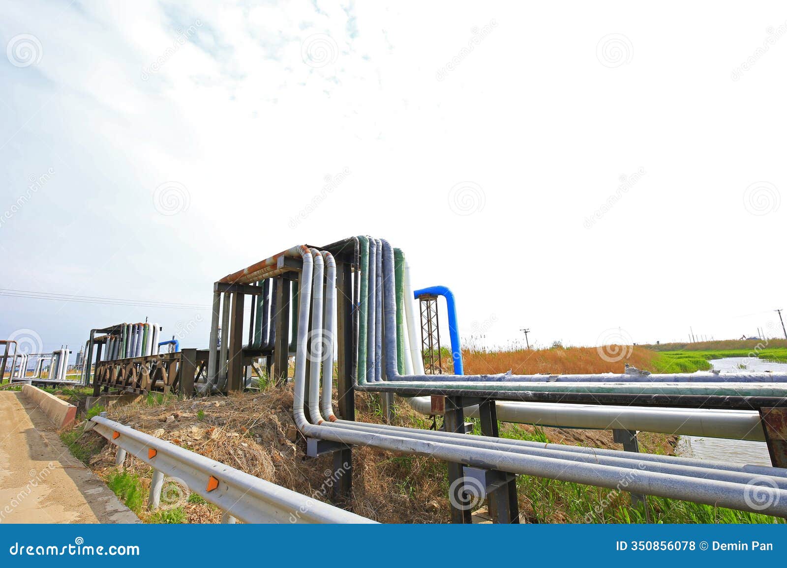 Oil pipes and valves stock photo. Image of industrial - 350856078