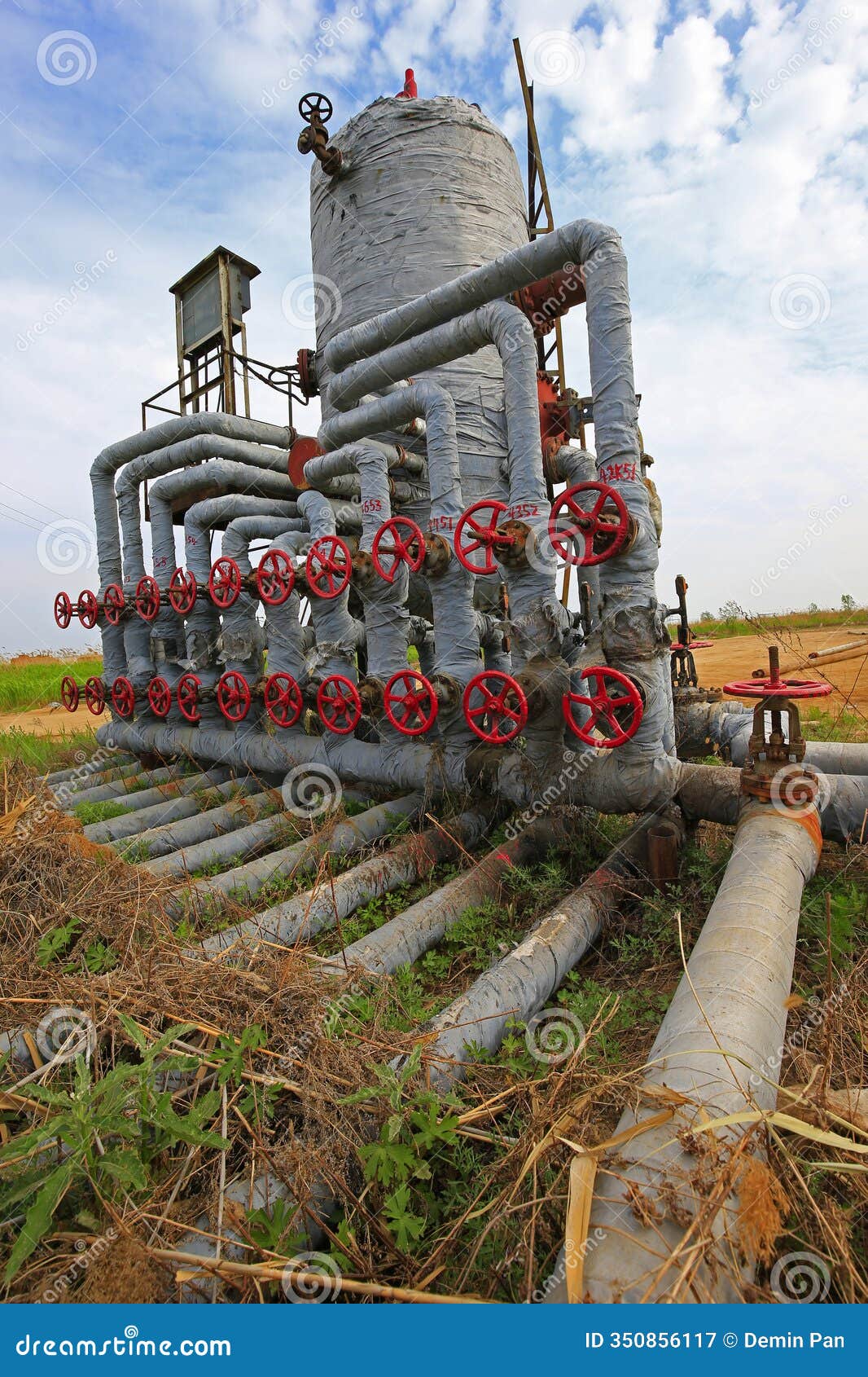 Oil pipes and valves stock image. Image of engineering - 350856117