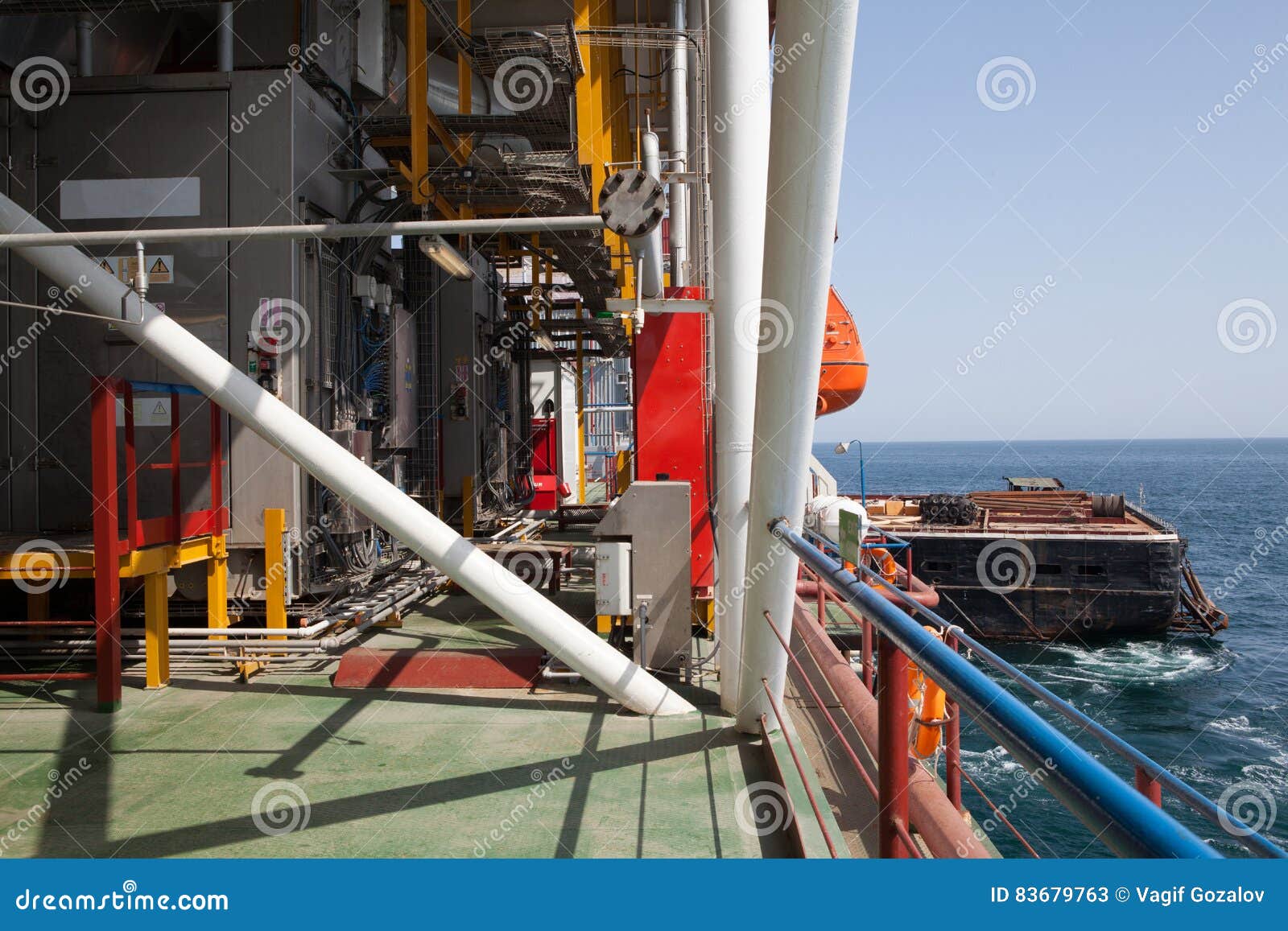 Oil Platform Constructions and Pipes Loading Ship Stock Image - Image ...