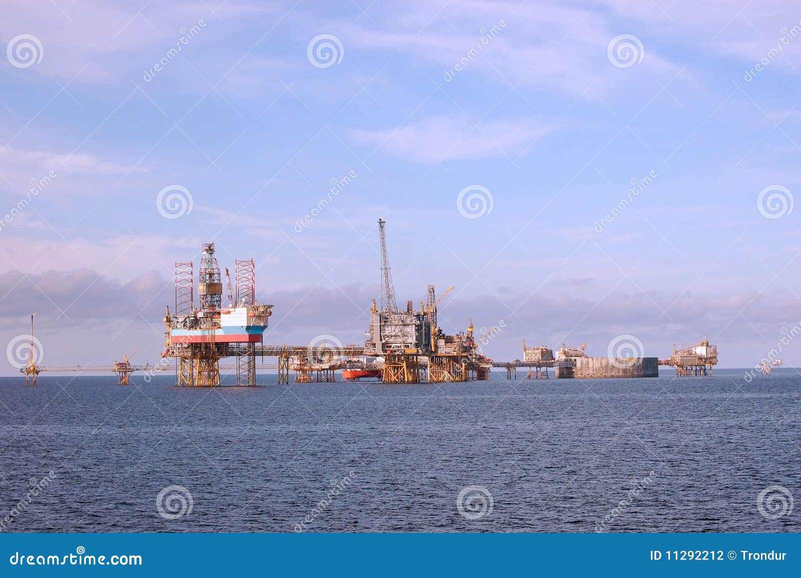 Oil platforms in North Sea stock photo. Image of clouds - 11292212
