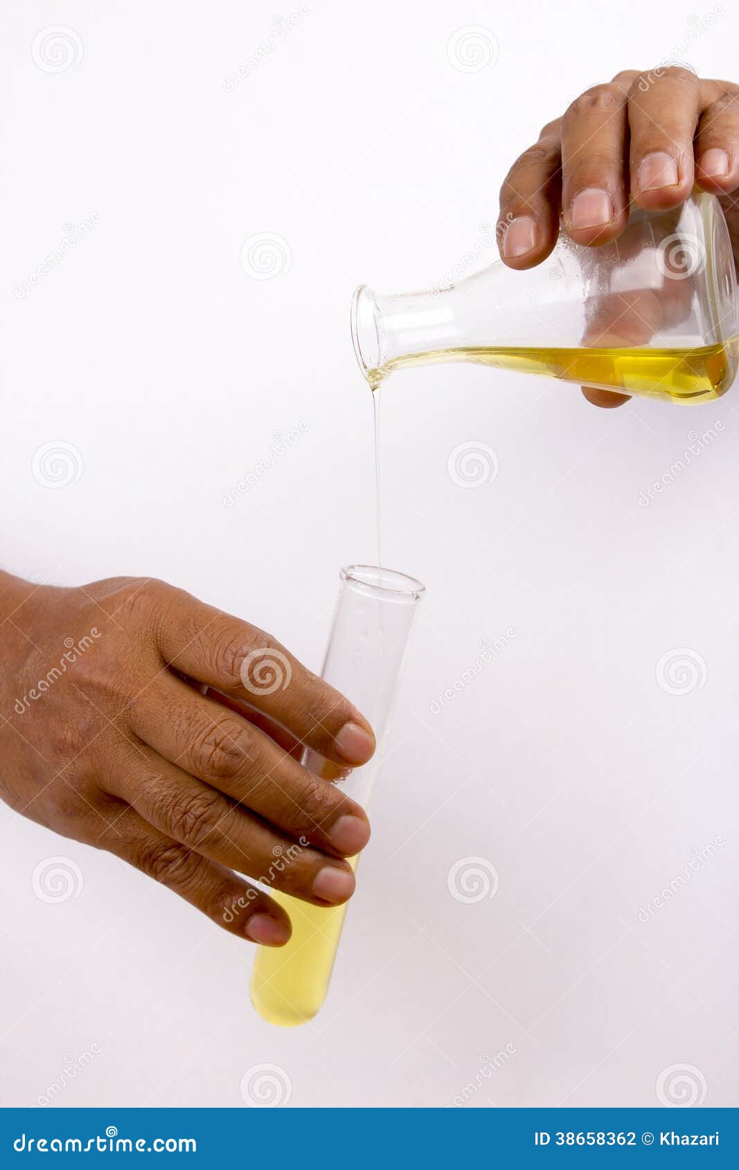 Oil pouring from a beaker stock photo. Image of pharmaceutical - 38658362
