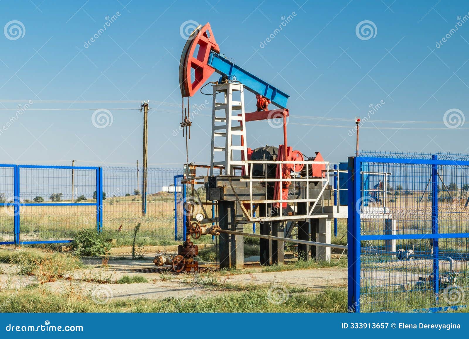 Oil Pump in Field on Background of Blue Sky Stock Image - Image of blue ...