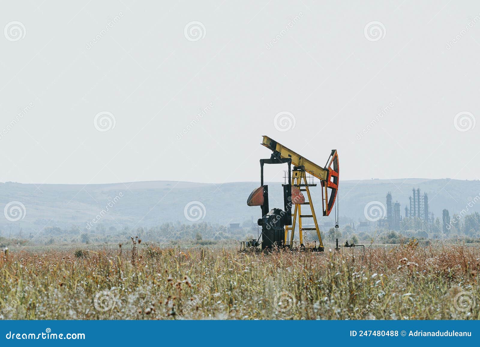 Oil pump on field stock photo. Image of plant, extraction - 247480488