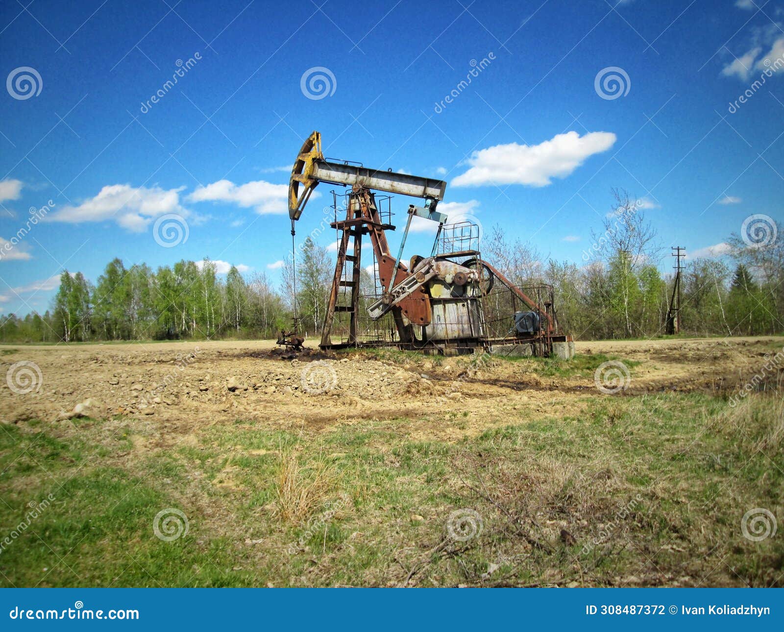 Oil Pump Jack in Field stock photo. Image of technology - 308487372