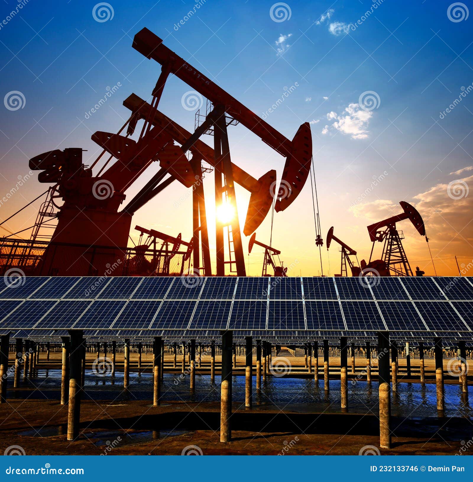 Oil pump with solar panels stock photo. Image of environment - 232133746