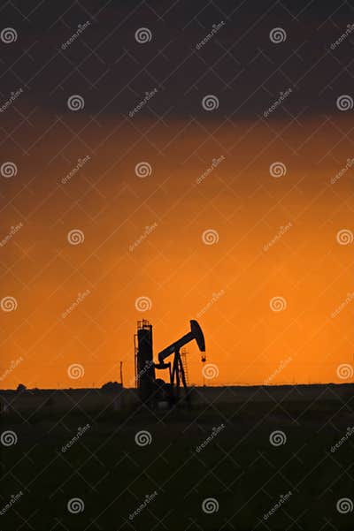 Oil pump at sunset stock photo. Image of fuel, drilling - 2223826